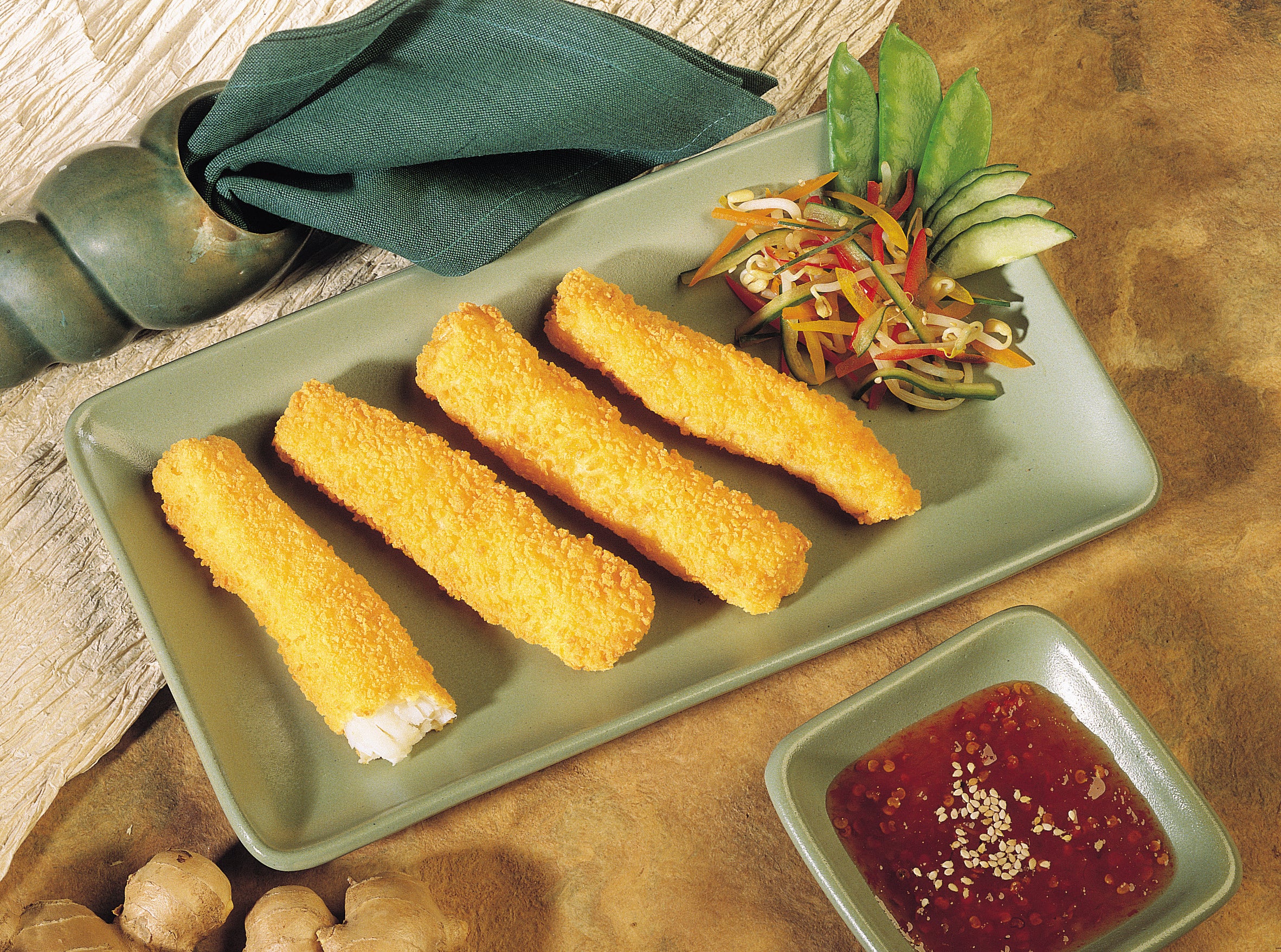 Crunchy Raw Breaded Cod Strips 5 Pound Each - 2 Per Case.